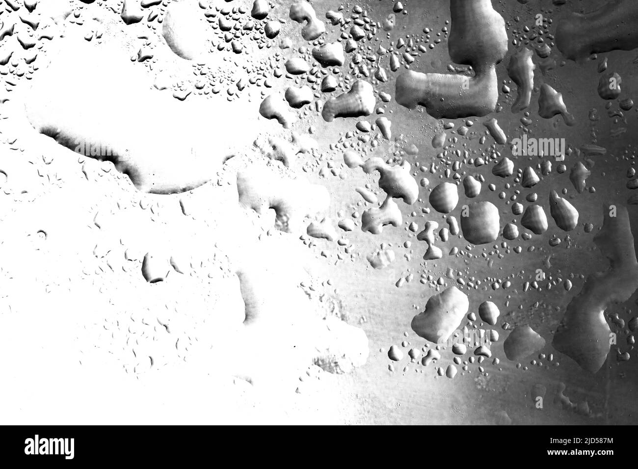 Colorful paint drops mixed Black and White Stock Photos & Images - Alamy