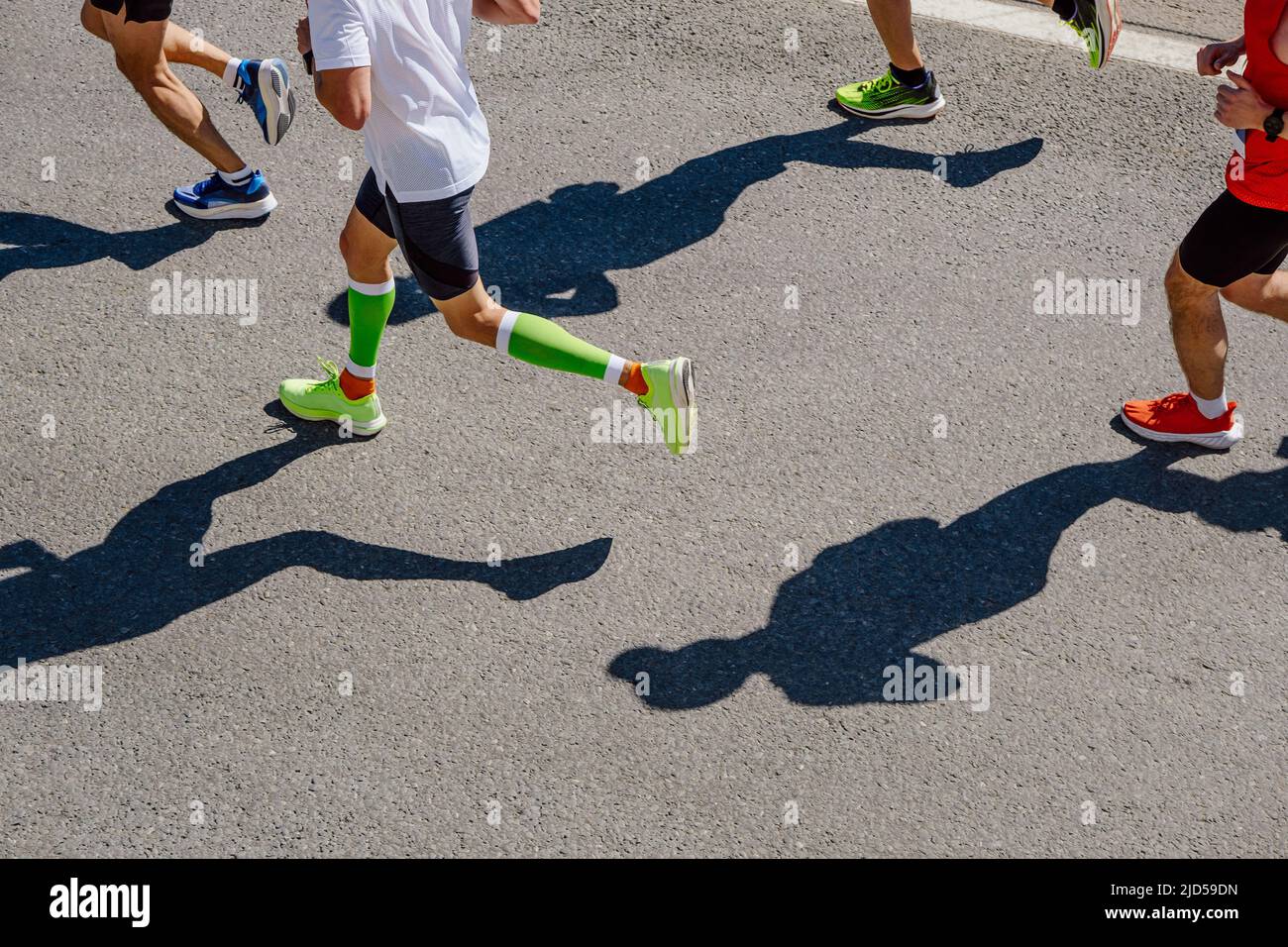 group runners athletes run marathon race top view Stock Photo - Alamy