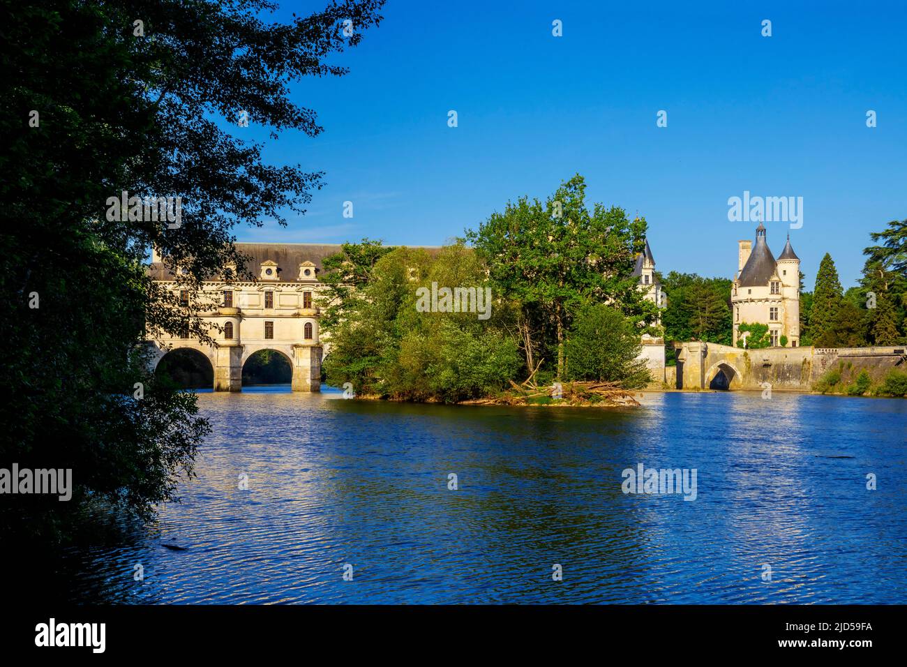 The Château de Chenonceau is a French château spanning the river Cher ...