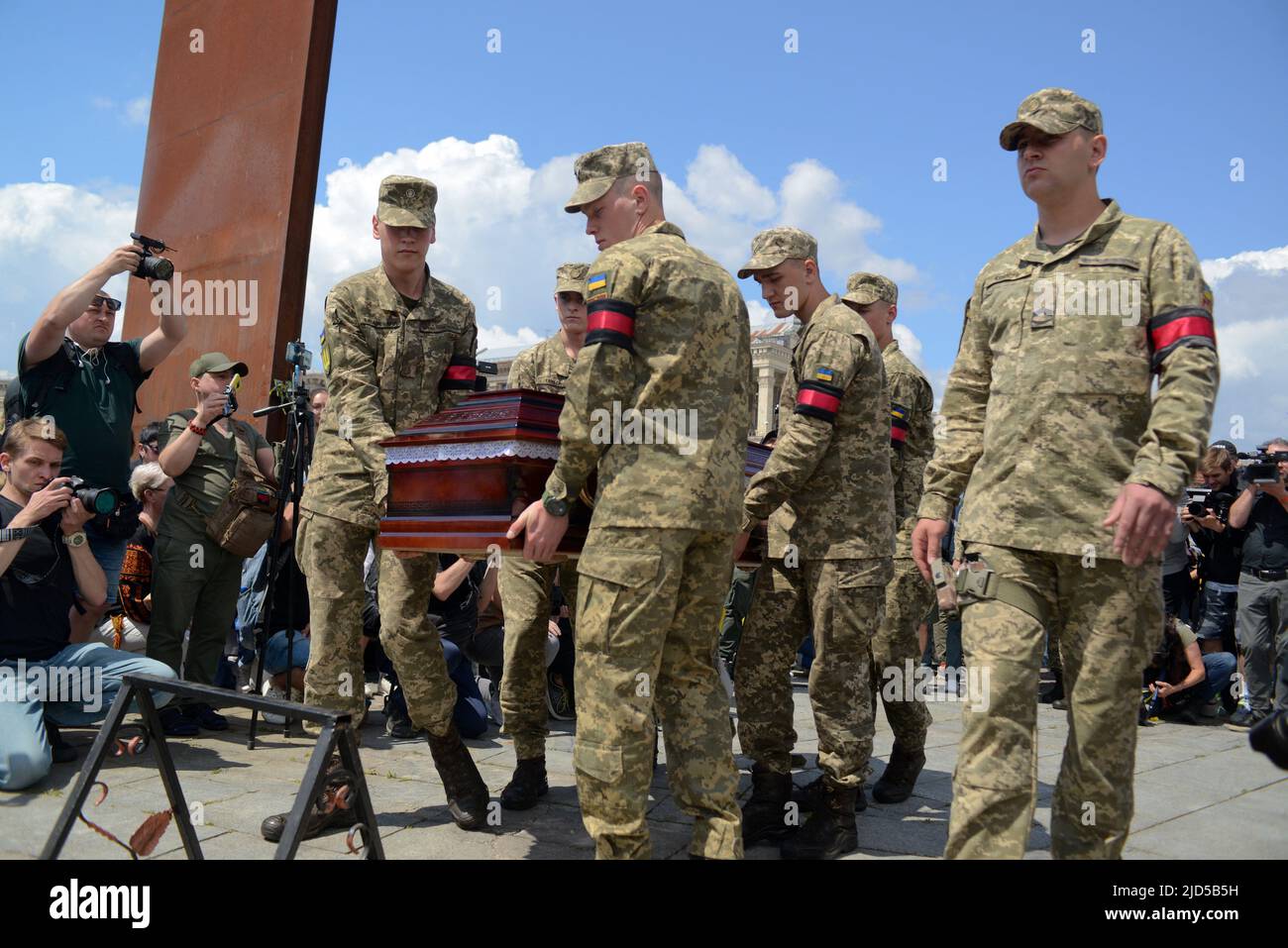 Kiev, Ukraine - June 18, 2022 - Soldiers carry the coffin with the body ...