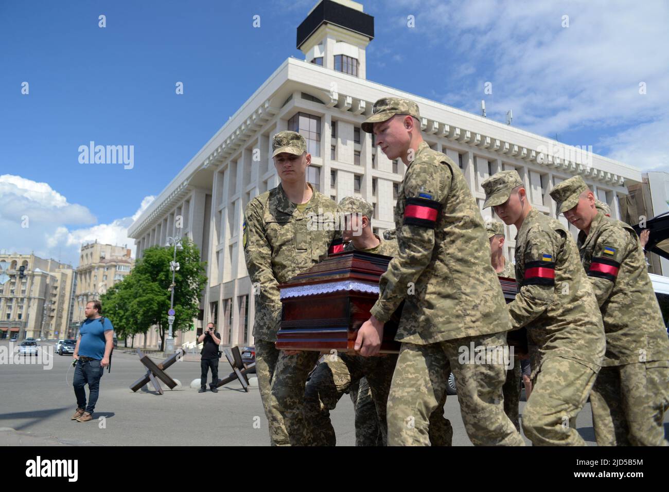 Kiev, Ukraine - June 18, 2022 - Soldiers carry the coffin with the body ...