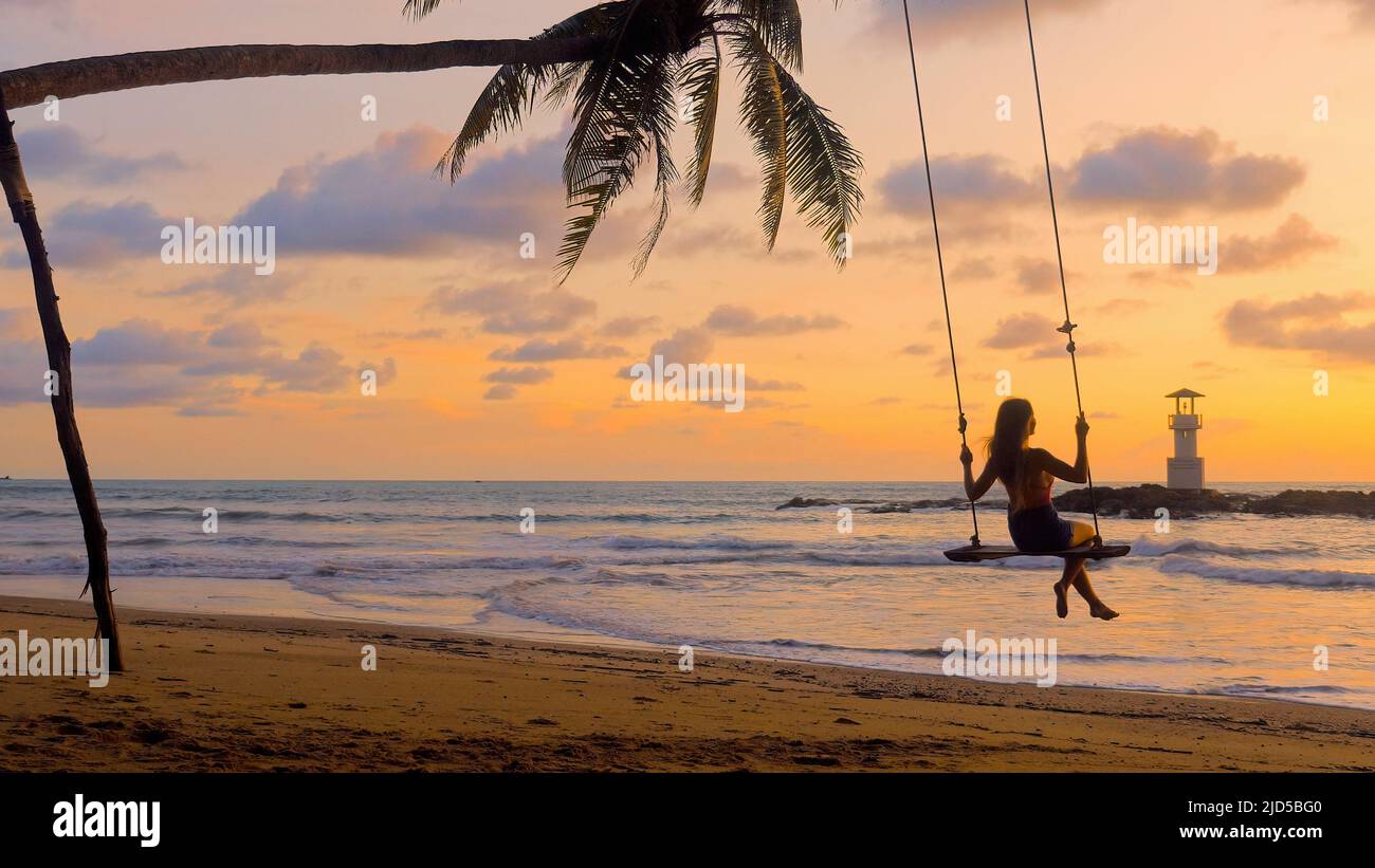 Swinging on rope hi-res stock photography and images - Alamy