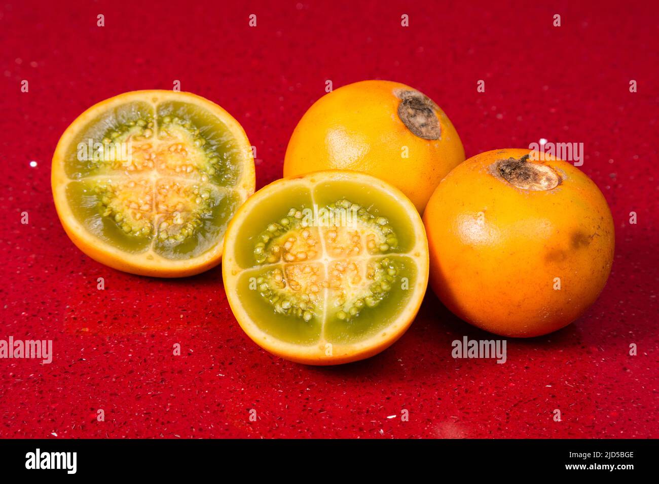 Lulo - Naranjilla (Solanum quitoense) tasty tropical fruit Stock Photo ...