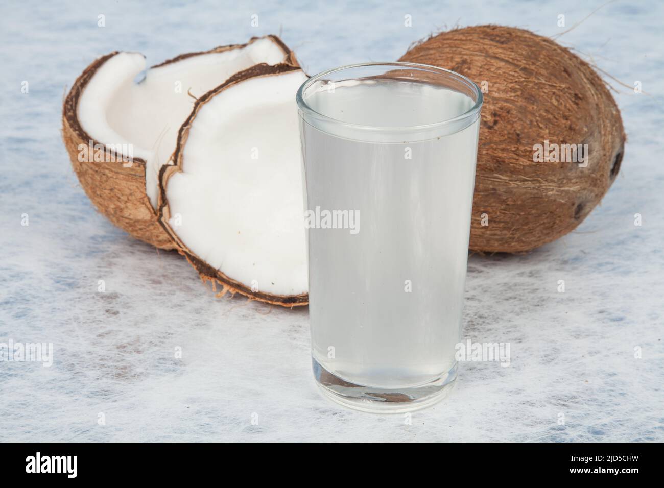 Healthy and natural coconut water; photo on neutral background Stock ...
