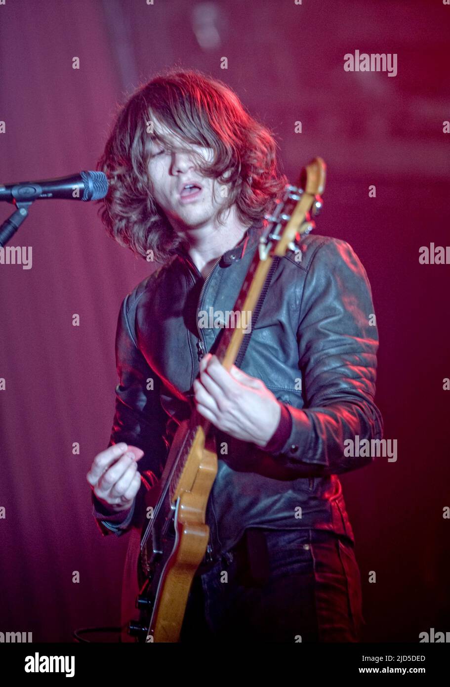 Arctic Monkeys lead singer Alex Turner performs on stage at SECC on ...
