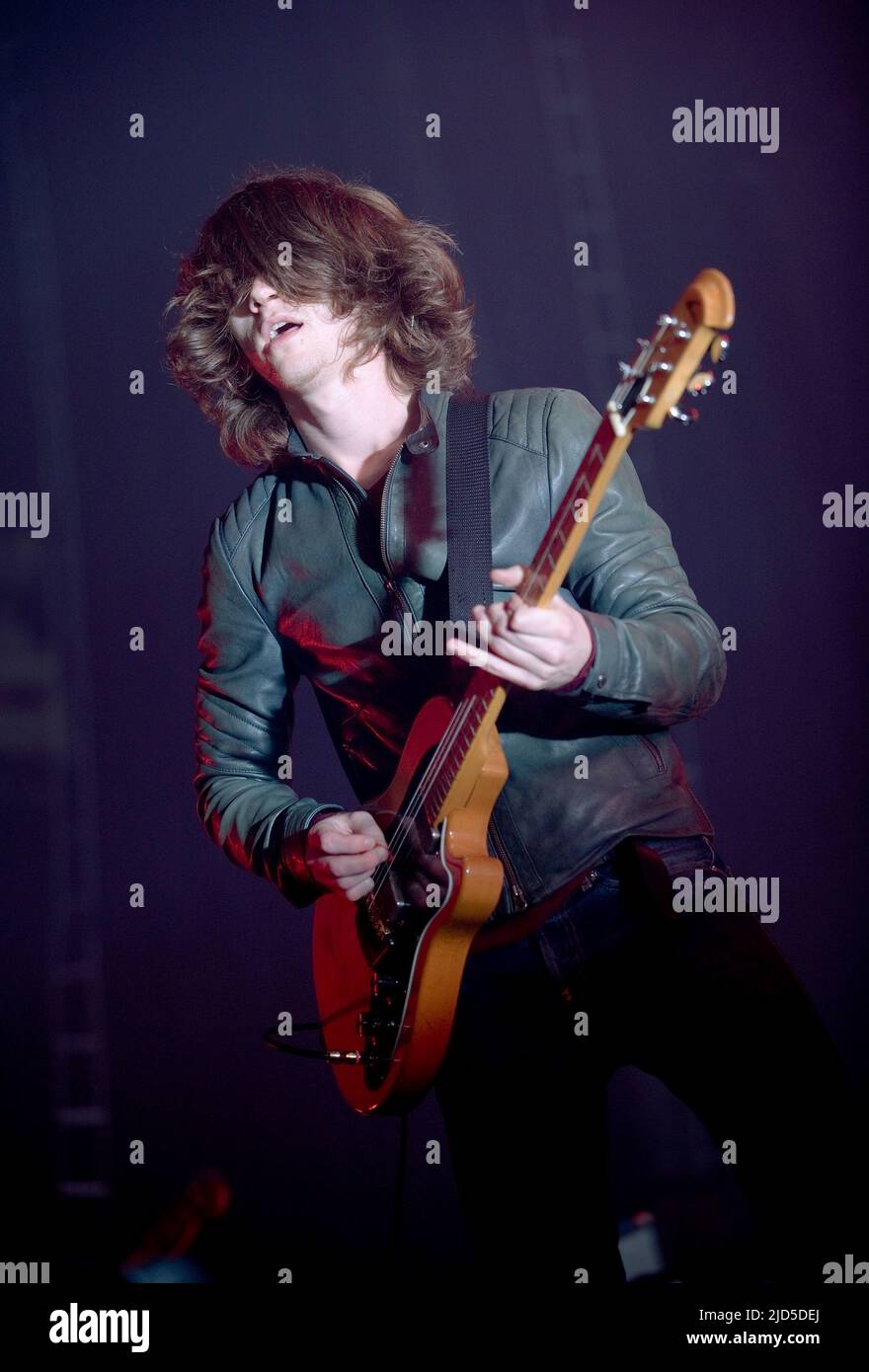 Arctic Monkeys lead singer Alex Turner performs on stage at SECC on ...