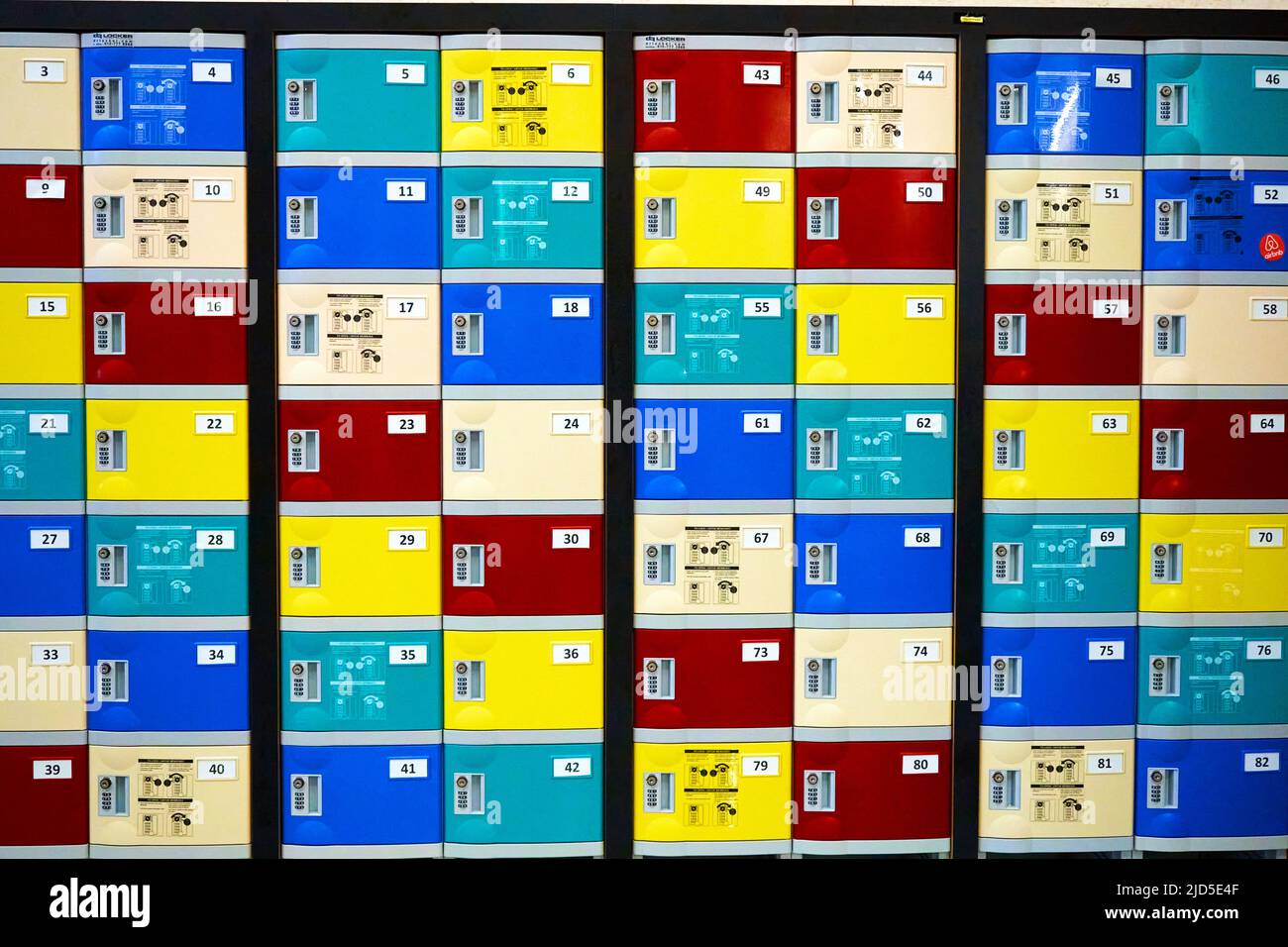 Colorful postal boxes in residential building hall Stock Photo - Alamy