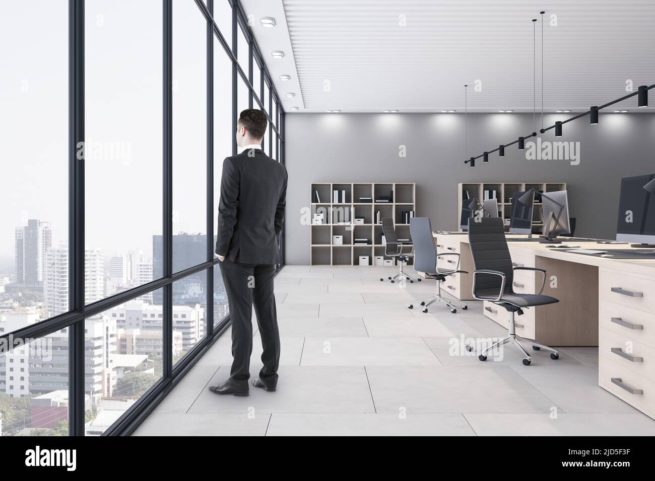 Business success concept with back view on businessman looking through ...