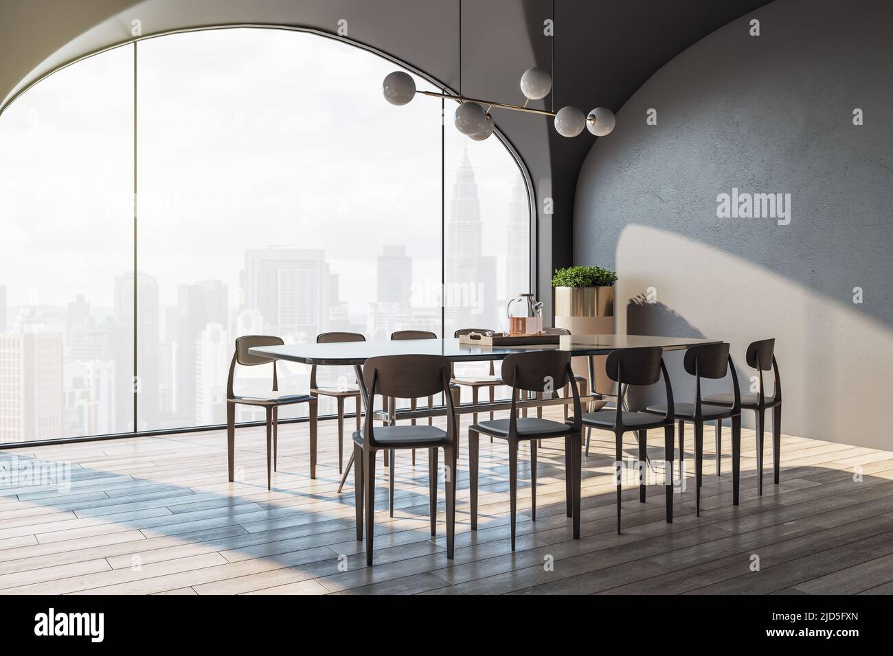 Side view on big arch window with city view and dining table surrounded ...