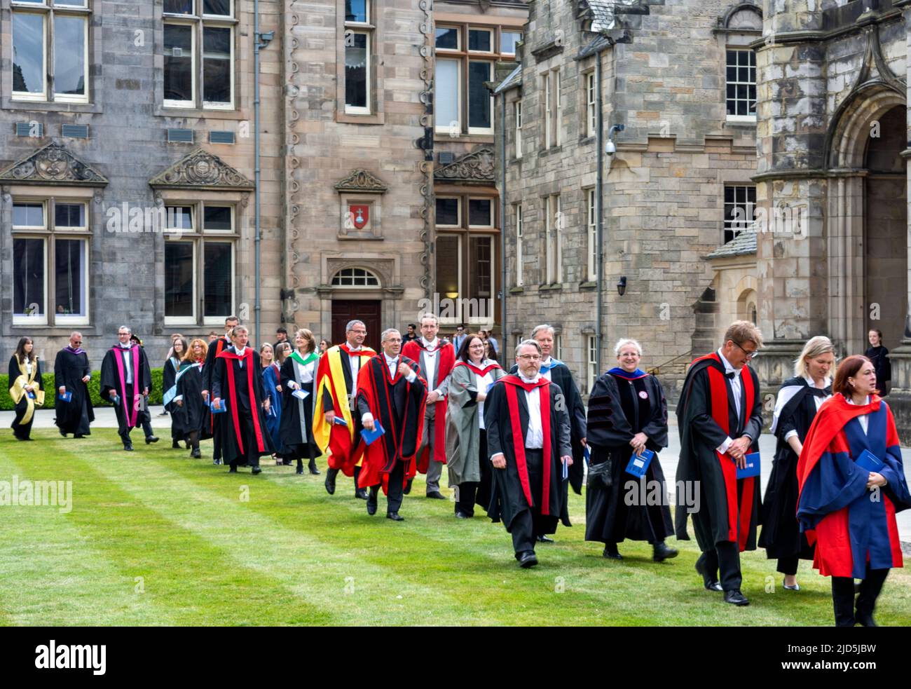 ST ANDREWS UNIVERSITY SCOTLAND ST SALVATORS QUAD PROCESSION ON A GRADUATION DAY STAFF AND ...