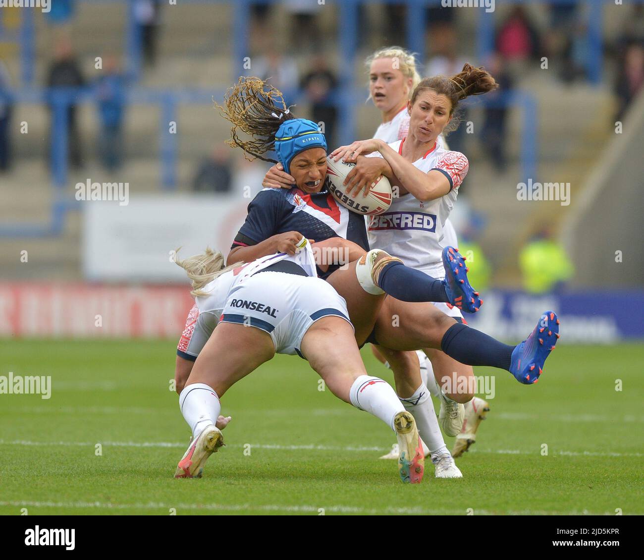 Warrington, England - 18th June 2022 - Elisa Akpa of France tackled by ...