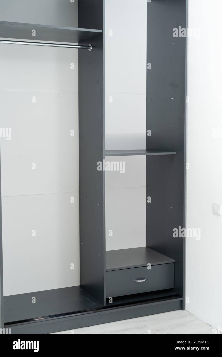 Gray drawer in the middle of the cabinet, installation of cabinets in ...
