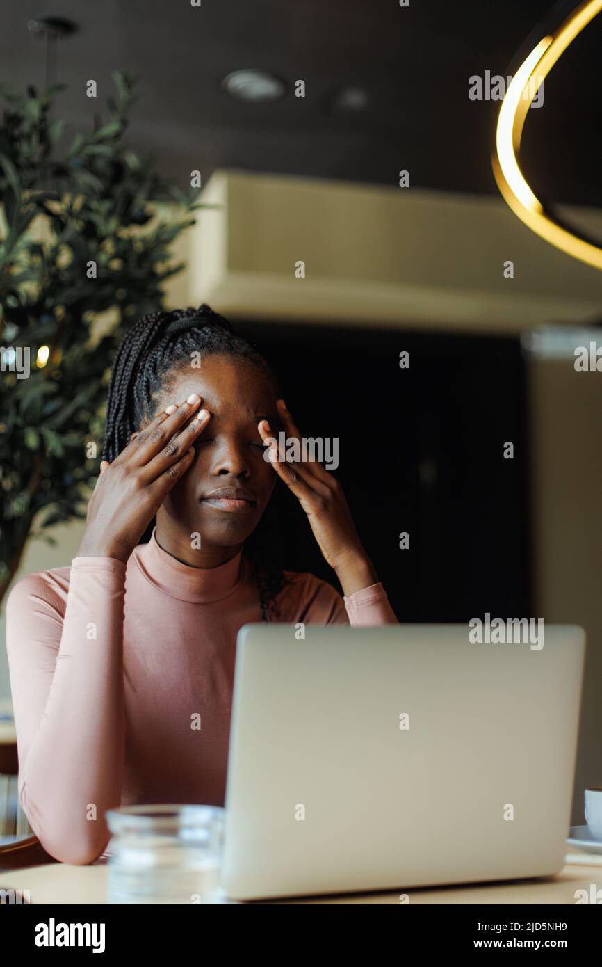 Young unhappy afro american woman with dreadlocks crying covering eyes ...