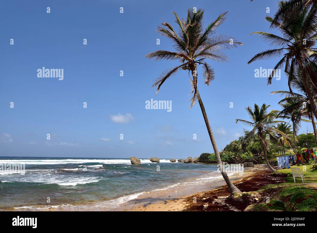 Blue sky above the beach of Bathsheba, East coast of island Barbados ...