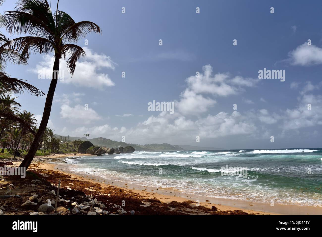 Blue sky above the beach of Bathsheba, East coast of island Barbados ...