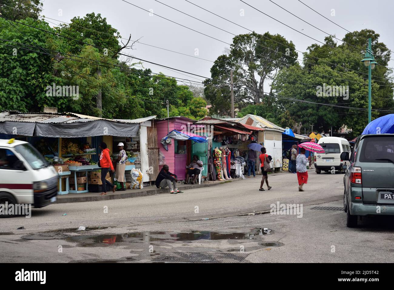BRIDGETOWN ,BARBADOS; February 19, 2020: People walking down street ...