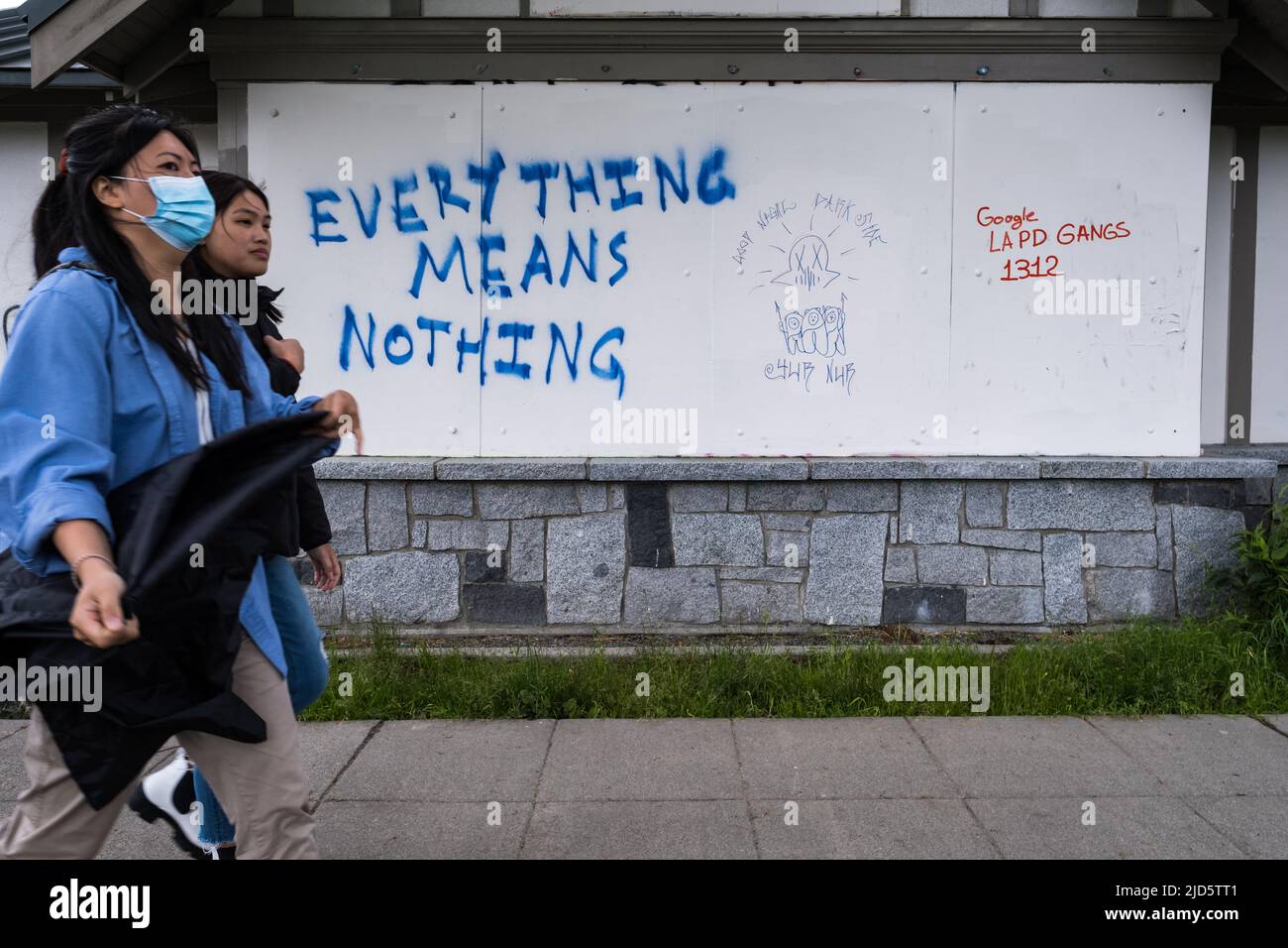 Seattle, USA. 5 Jun, 2022. People walking past Graffiti on Capitol Hill ...
