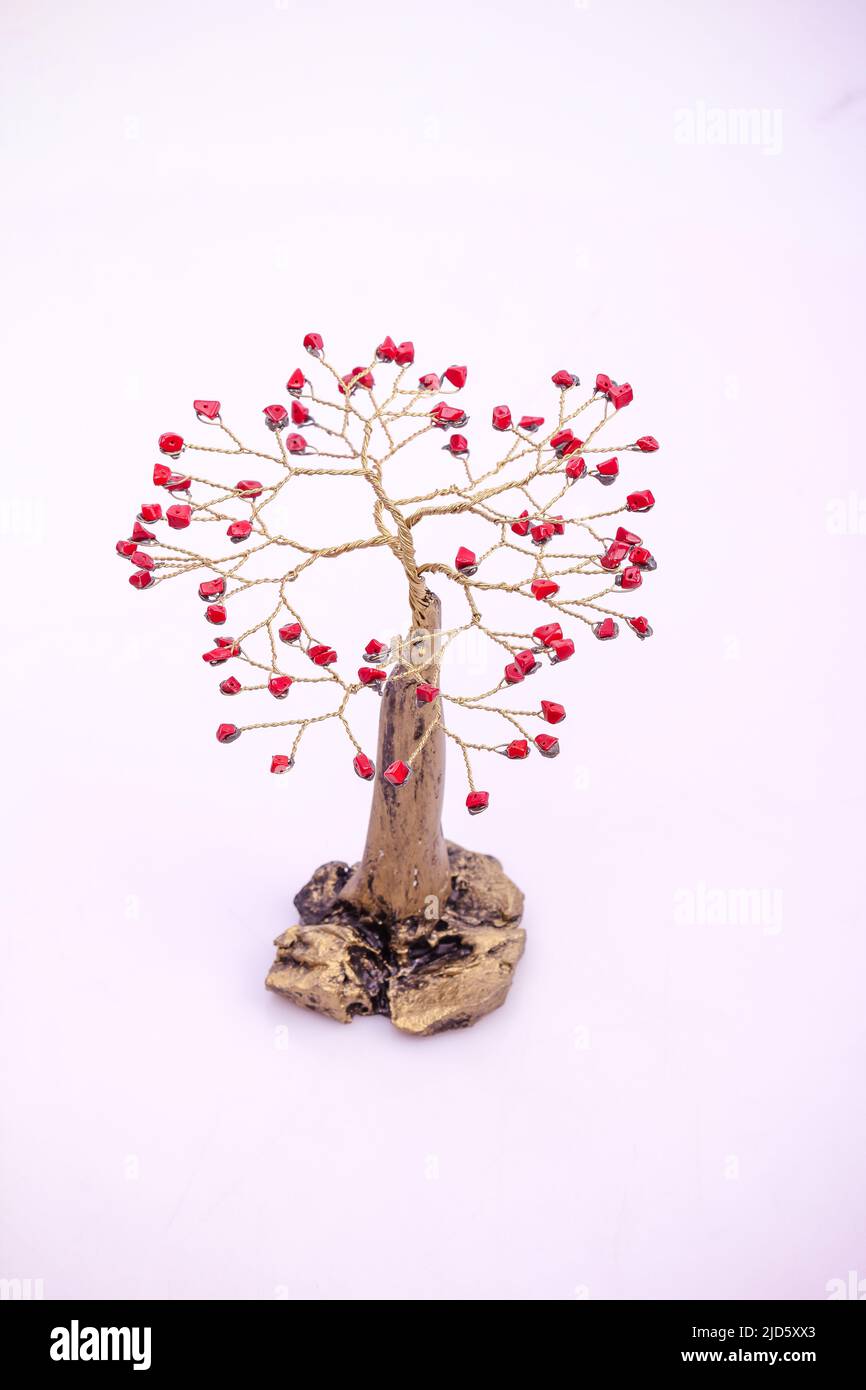 Hand-crafted merry Christmas tree plastic on white background in Kenya ...