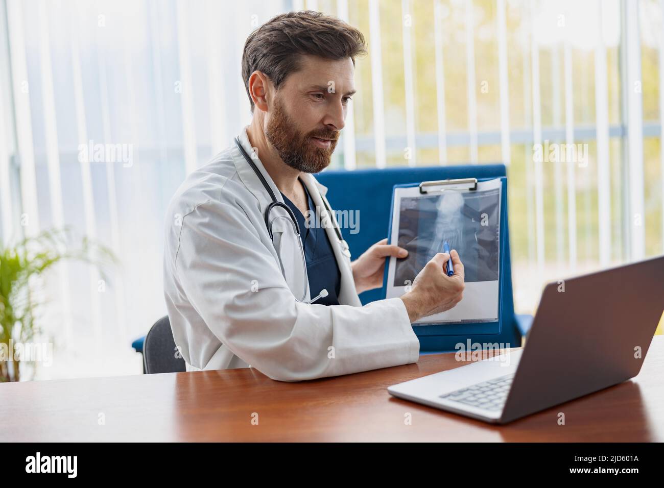 Therapist conducts video consultations, communicates with the patient ...