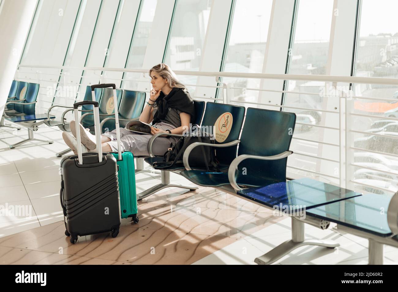 Hand woman passenger holding hi-res stock photography and images - Alamy