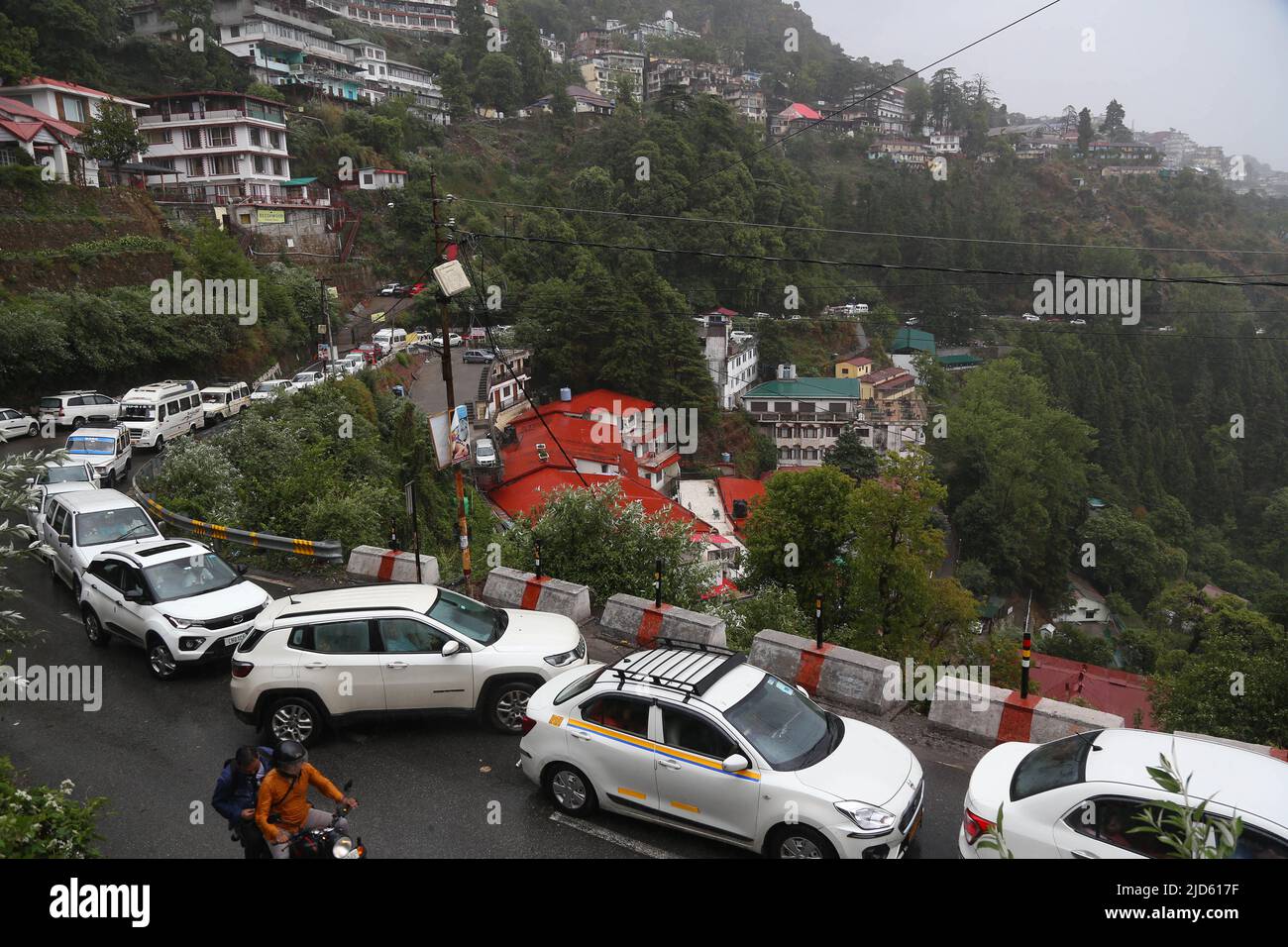 Mussoorie, Uttarakhand, India, June 18, 2022: Vehicles moving slowly in ...