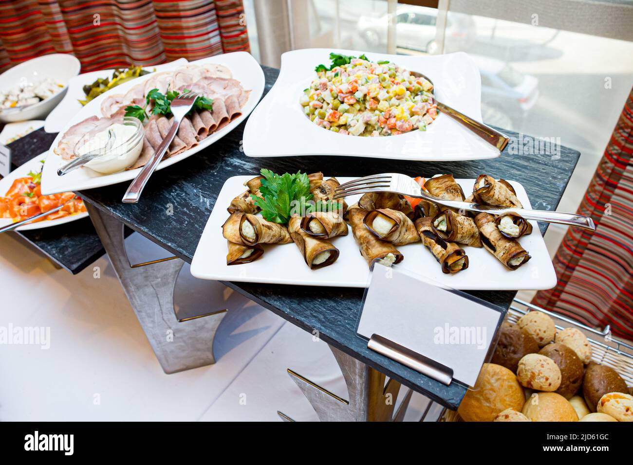 Catering serving. Buffet line in the hotel restaurant. Plates of food ...