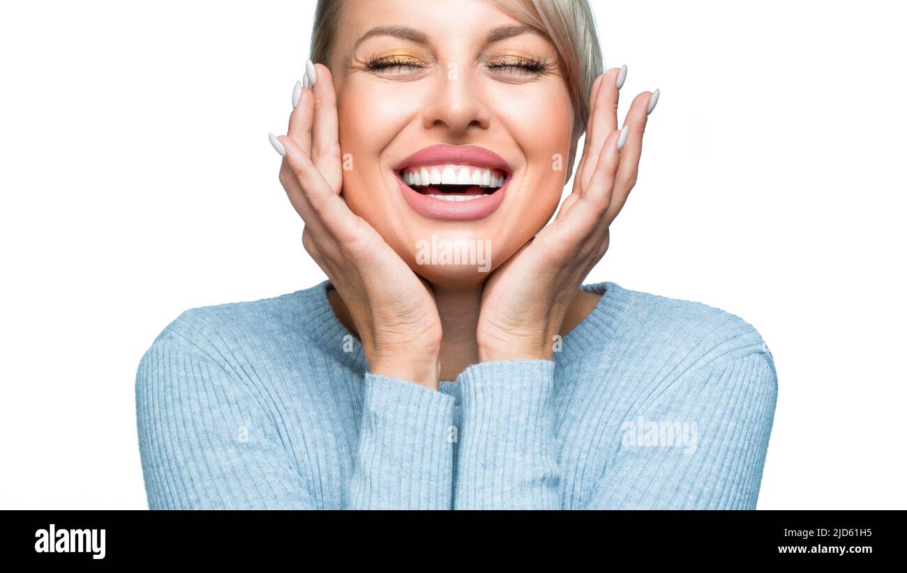 Laughing woman with great teeth over white background. Dental health ...