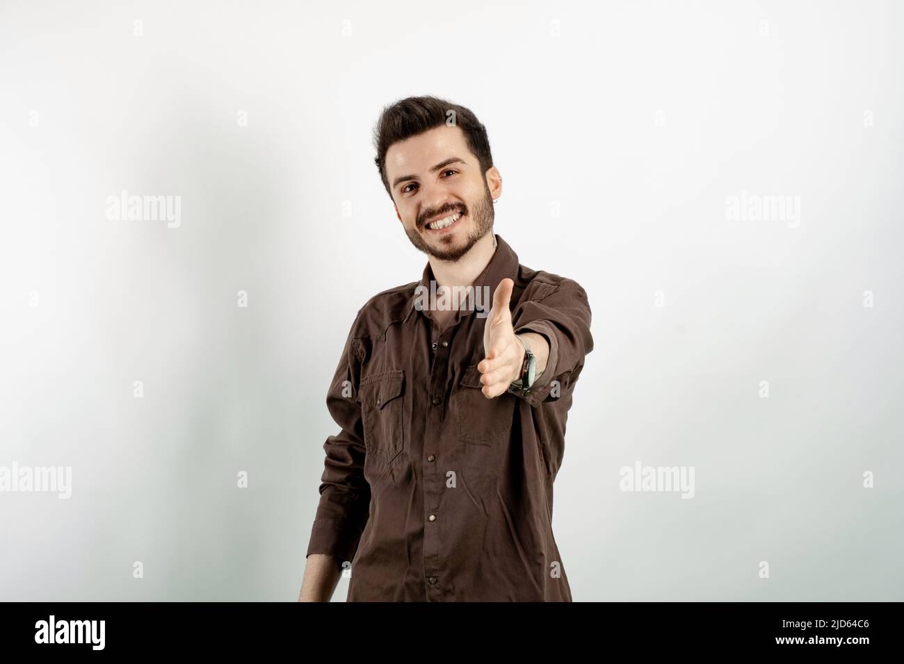 Handsome welcoming man smiling isolated hi-res stock photography and ...
