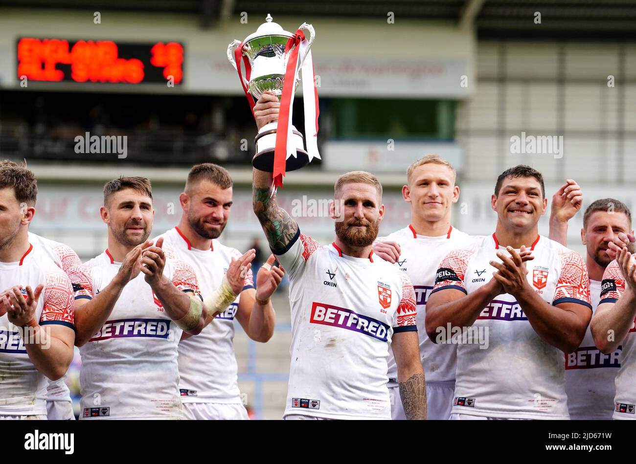 EnglandÕs Sam Tomkins lifts the trophy after the Mid-Season ...