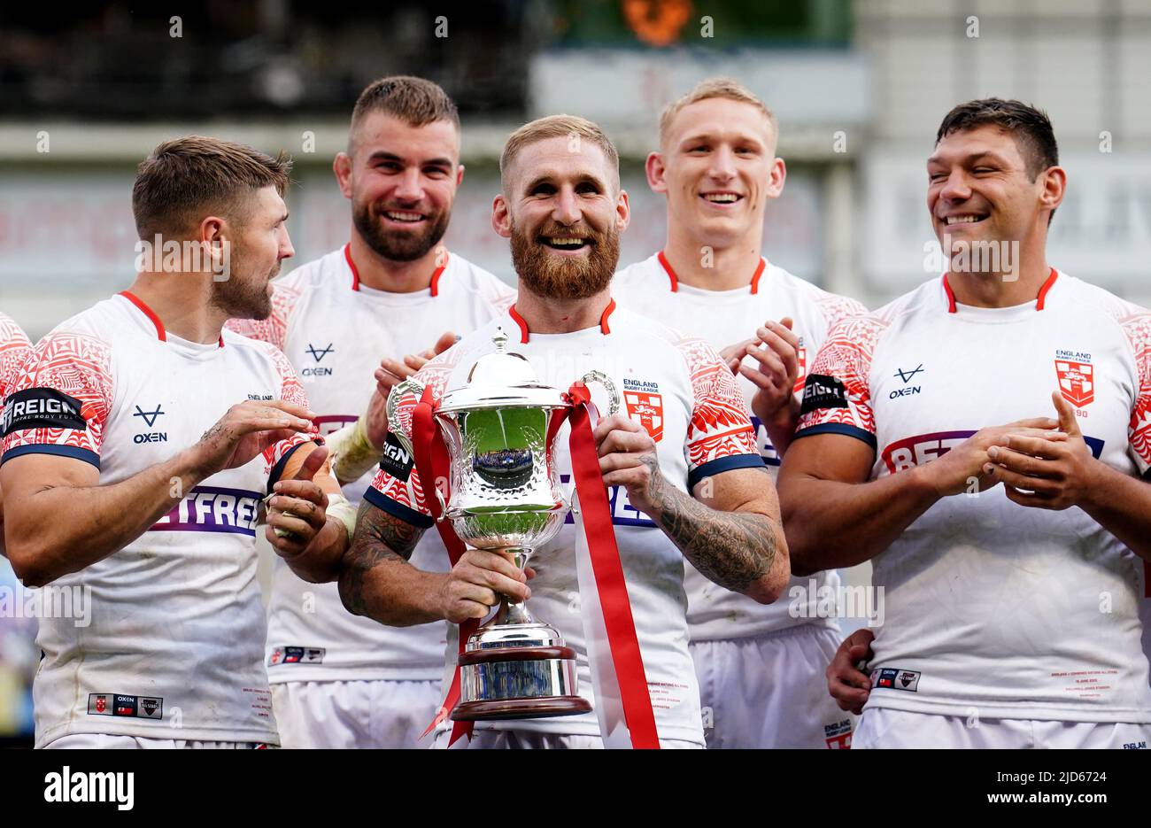 EnglandÕs Sam Tomkins lifts the trophy after the Mid-Season ...