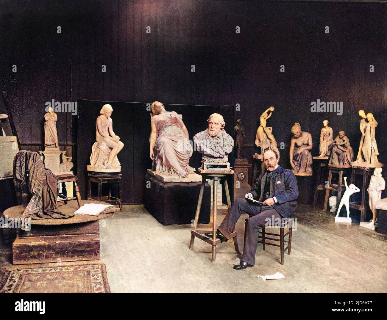 GEORGE A LAWSON sculptor, photographed in his studio surrounded by ...