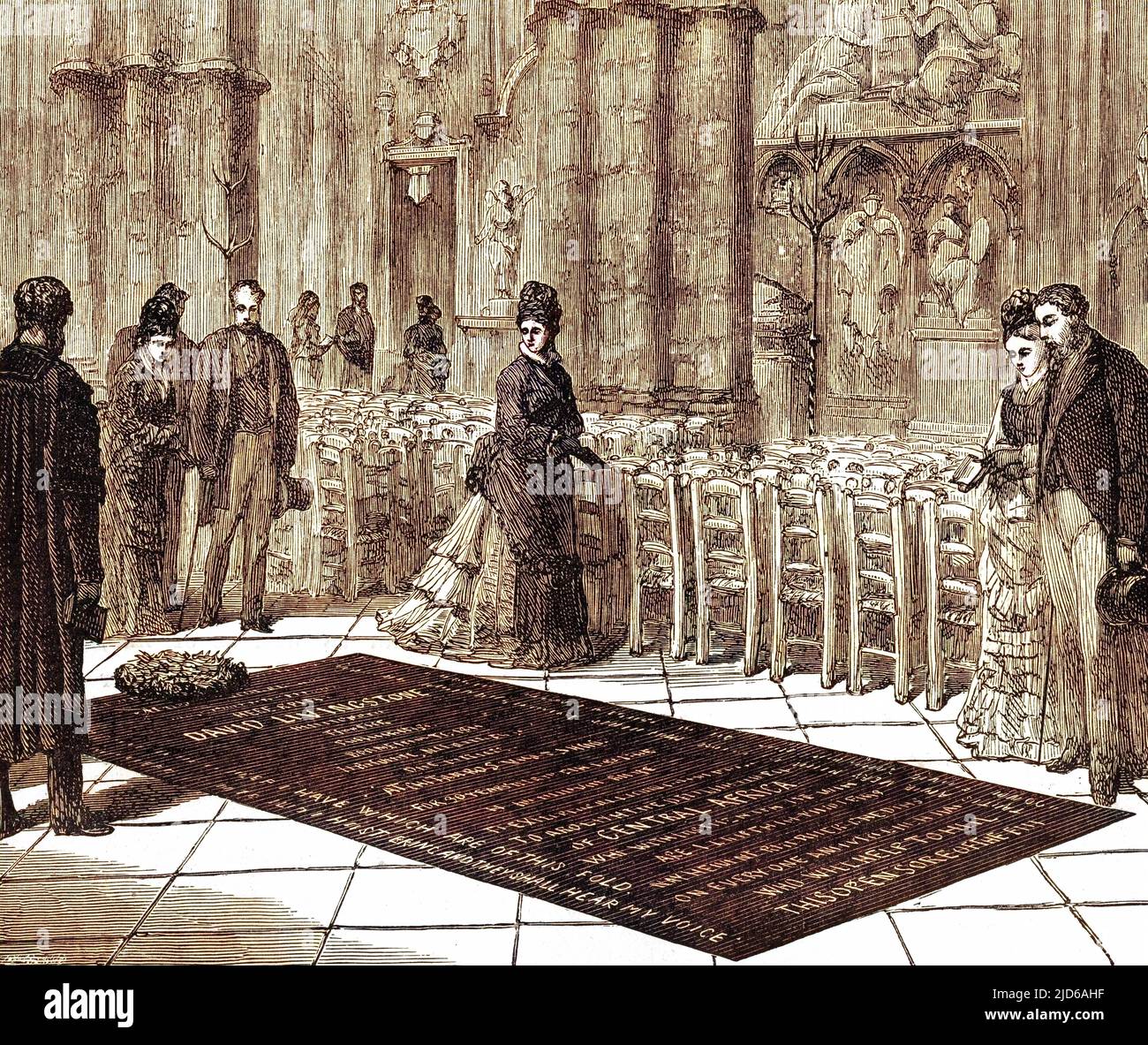 Sightseers respectfully examine the slab marking the grave of DAVID ...