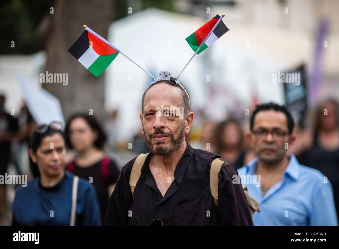 Tel Aviv, Israel. 18th June, 2022. An Israeli man takes part in a march ...