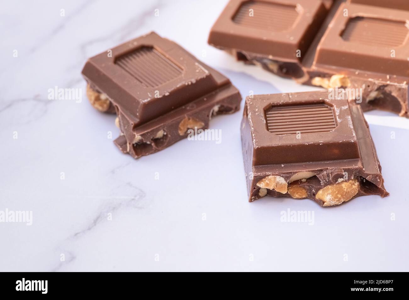 Four pieces of dark chocolate hi-res stock photography and images - Alamy