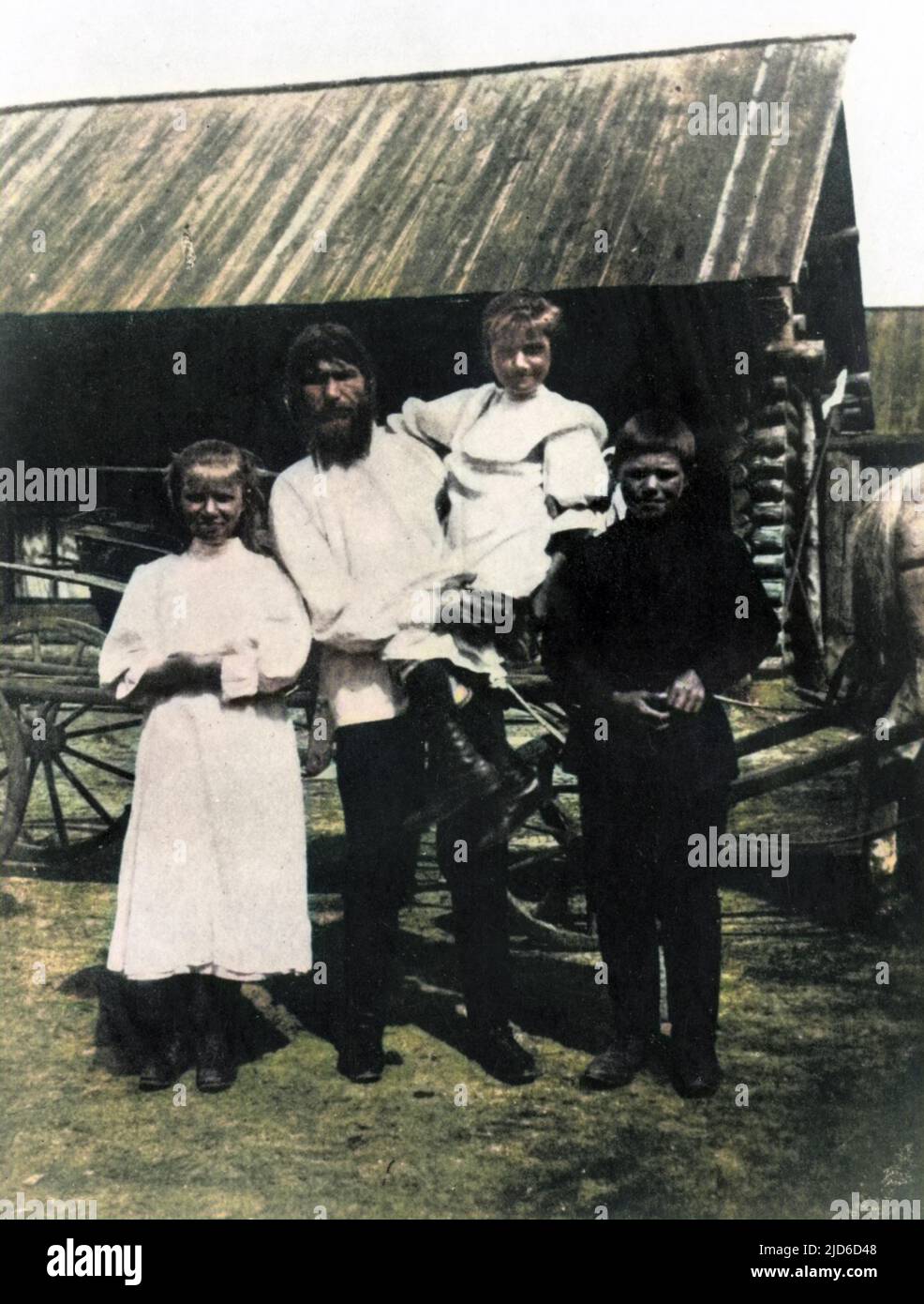 RASPUTIN with three of his children at Pokrovskoe. Colourised version ...