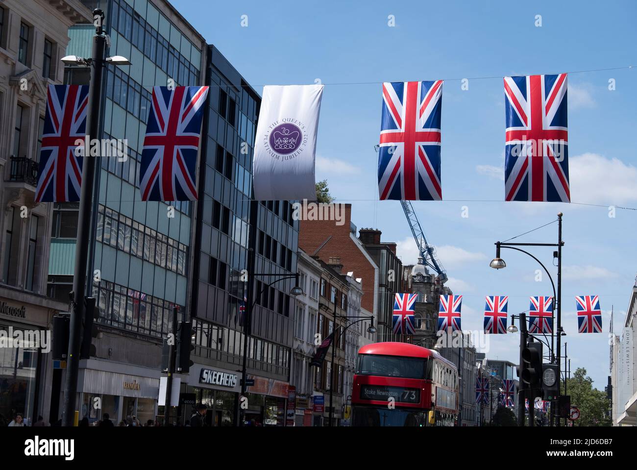 Central London street filled with the union jack flags for celebration ...