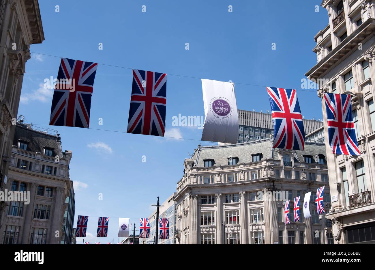 Central London street filled with the union jack flags for celebration ...