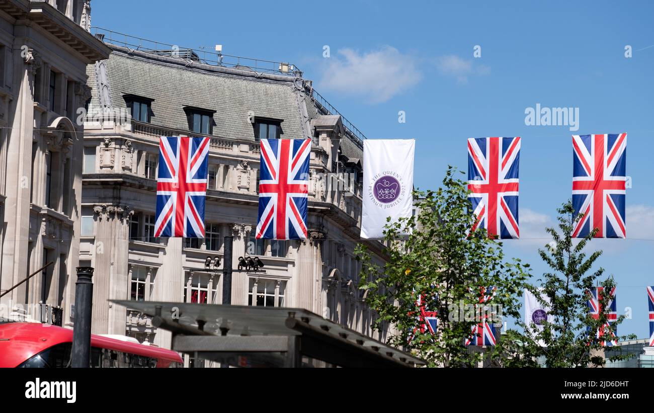 Central London street filled with the union jack flags for celebration ...