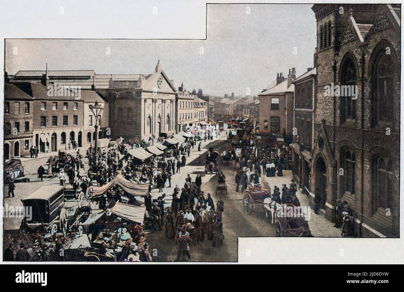 The Market Place at Newbury, Berkshire, on a busy day. Colourised ...