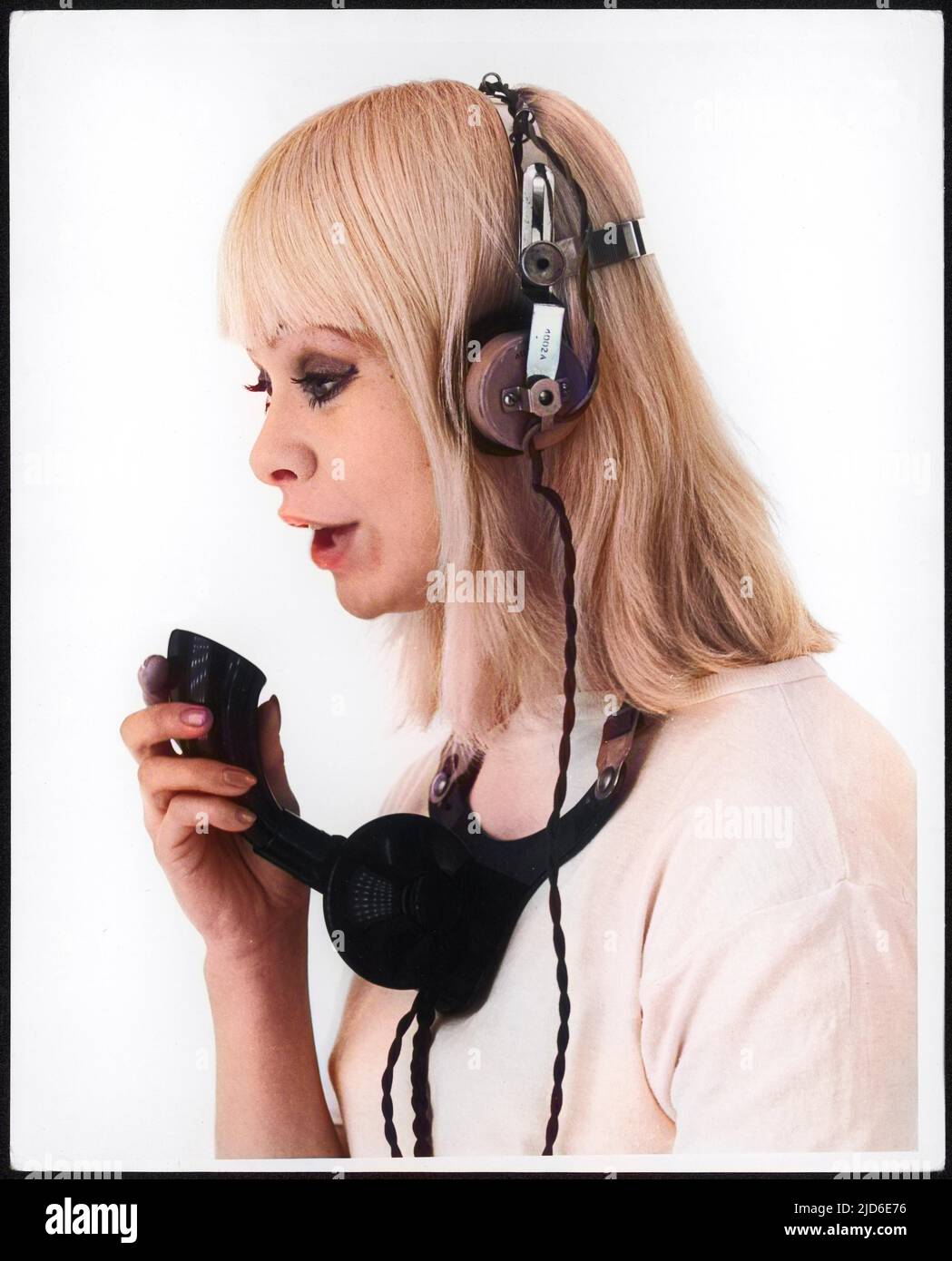A telephone receptionist (possibly working for the emergency services ...