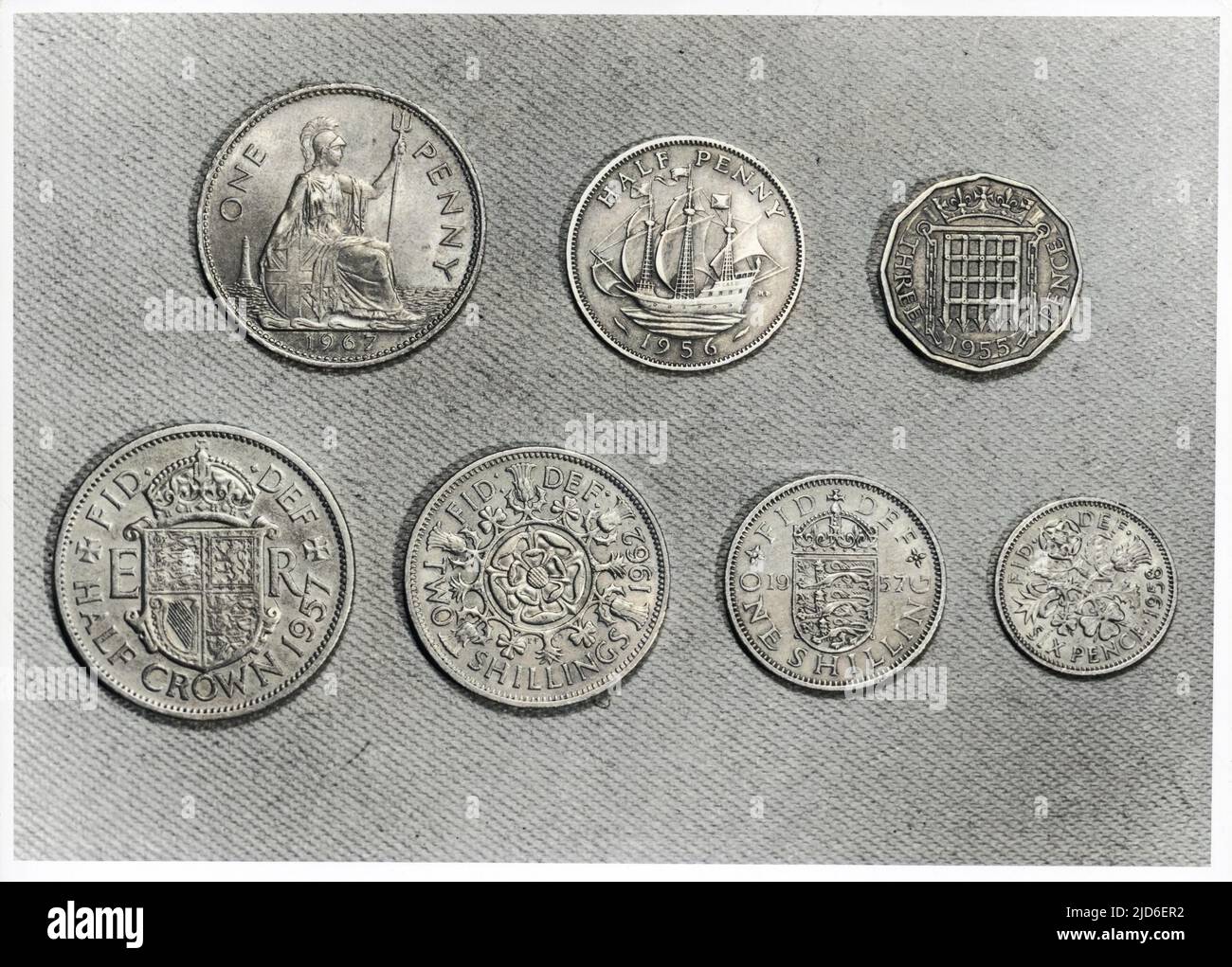 Old' (pre-Decimalisation) British coins (left to right): Top - penny ...