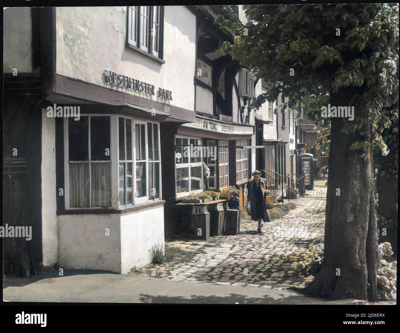 A corner of the old and picturesque Market Square at Lenham, Kent ...