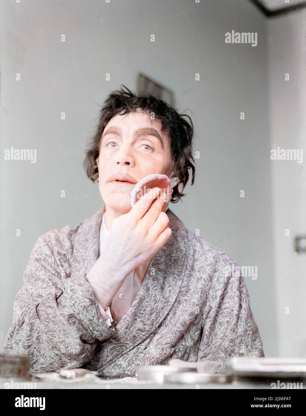 Actor George H. Mulcaster (1891 - 1964), wearing a wig, backstage in ...