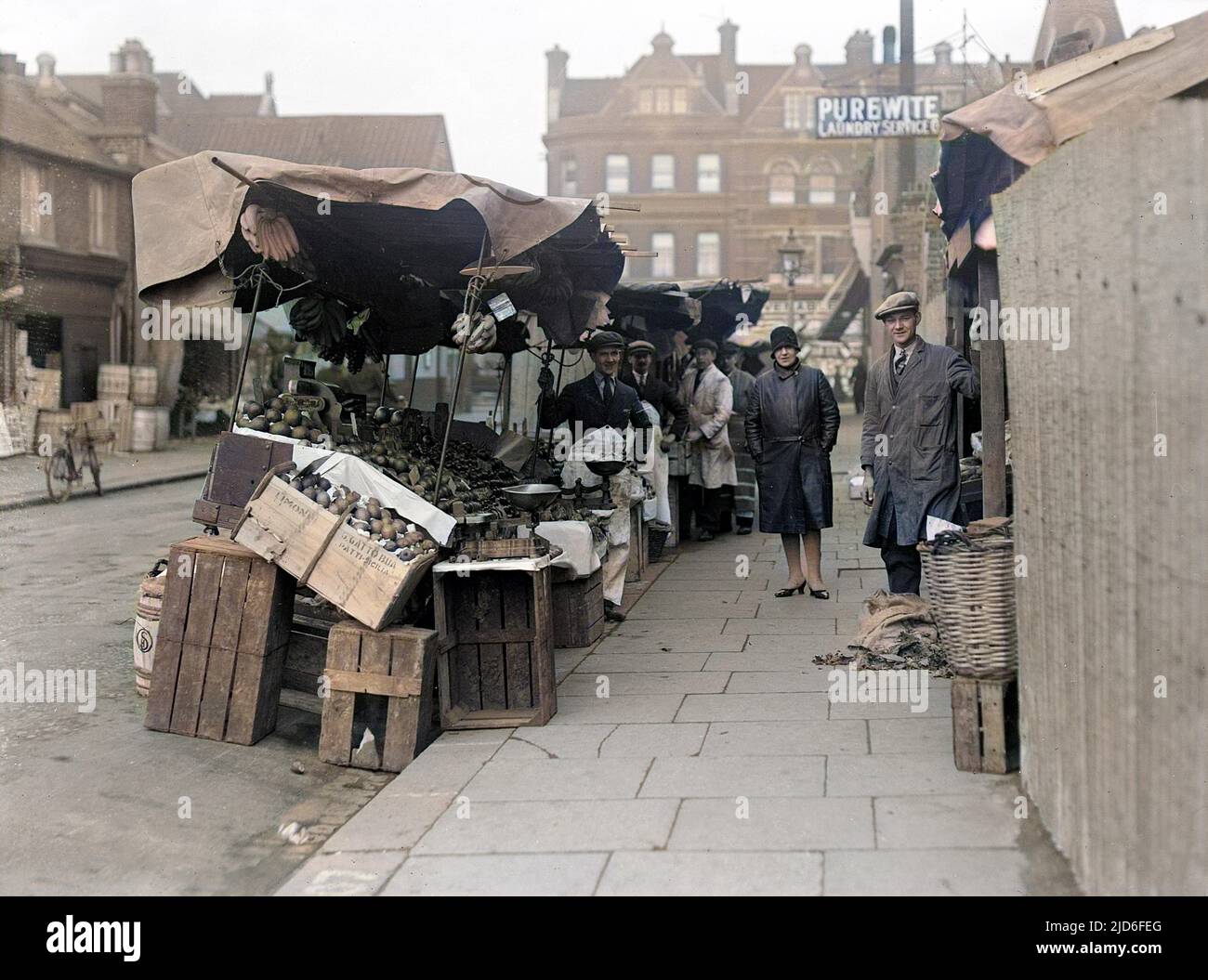 The fruit and veg stall, Tooting Market, London, England. Colourised ...