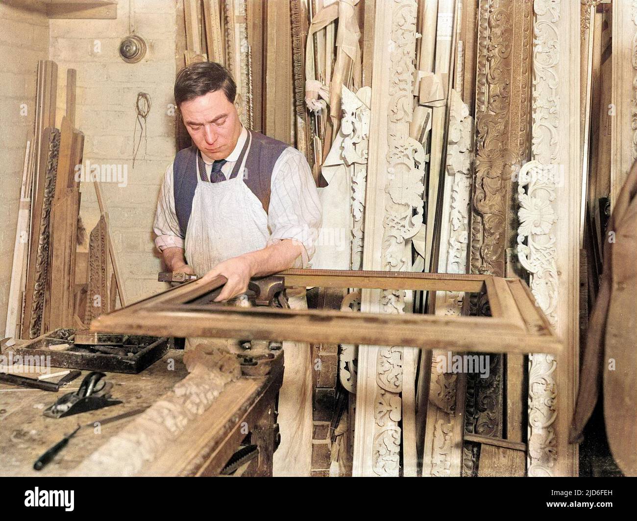 Making picture frames. Colourised version of : 10164320 Date: early ...