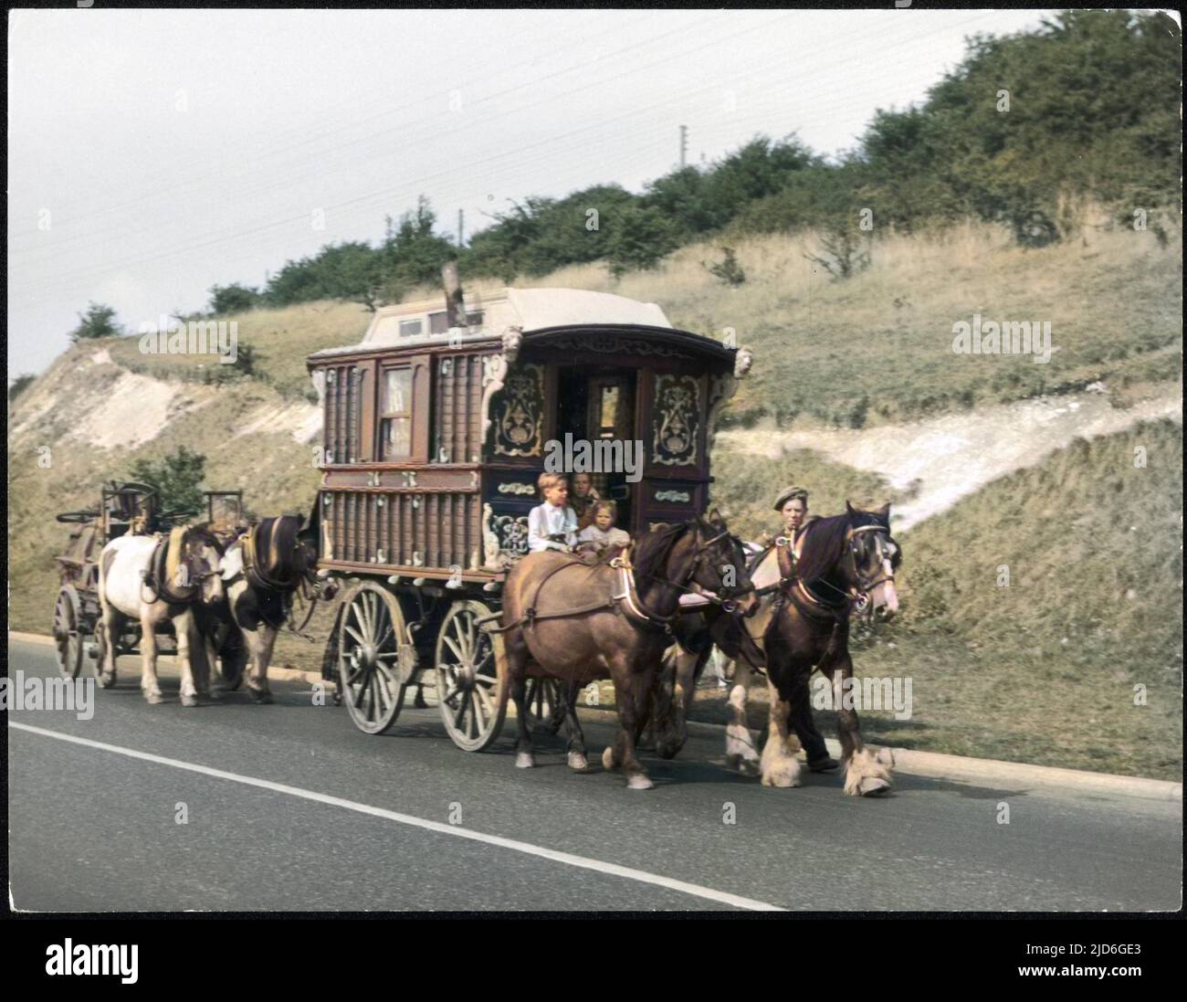 A gipsy family in their traditional caravan, on Wrotham Hill, Kent ...