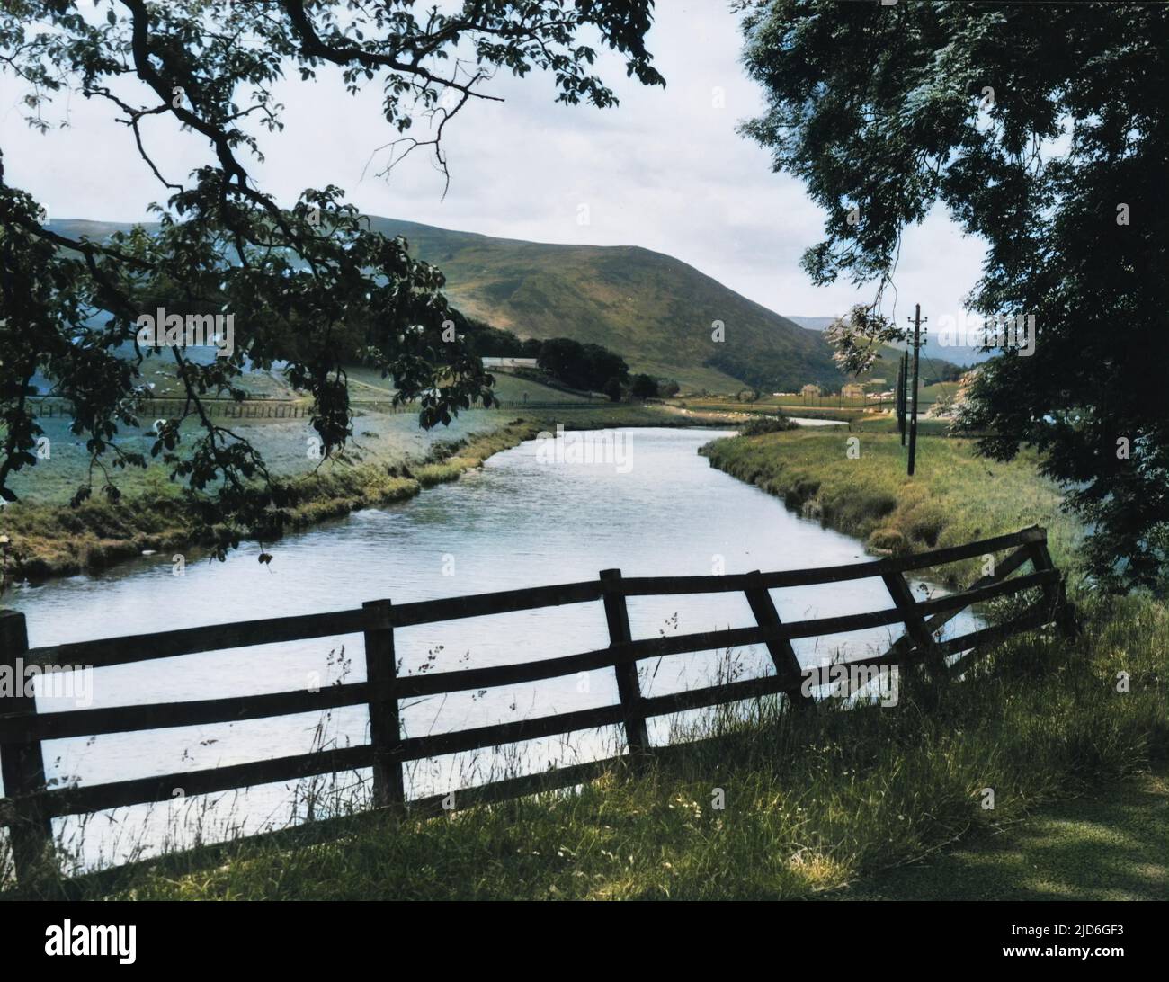 A charming view of the River Tweed, as it flows through the lovely ...