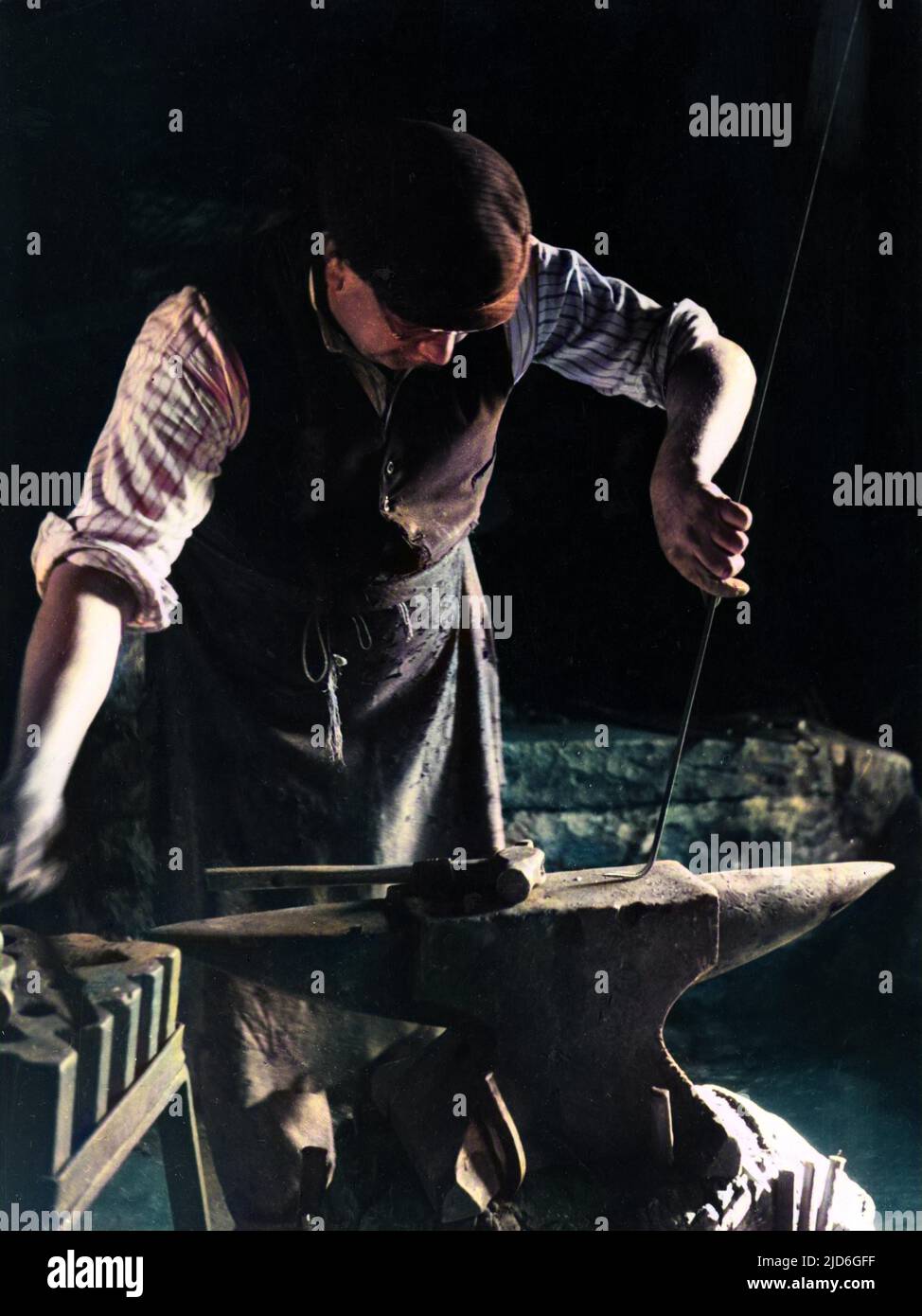 The Smithy (blacksmith) at work at his anvil in Dent, Yorkshire ...