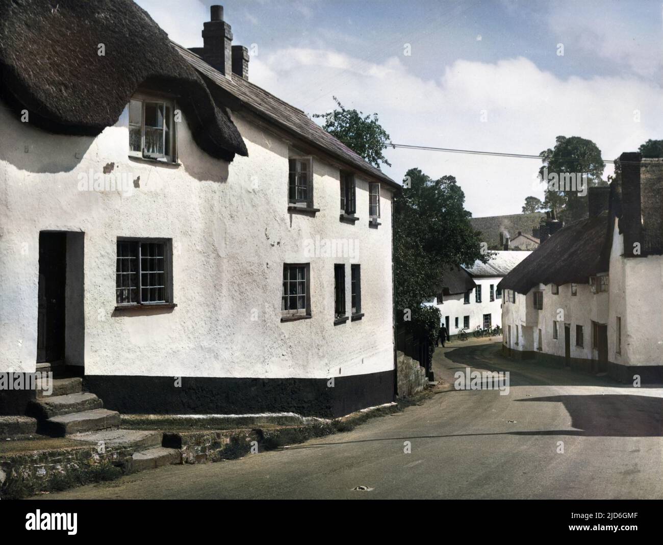 A glimpse of some typically whitewashed and thatched Devonshire ...