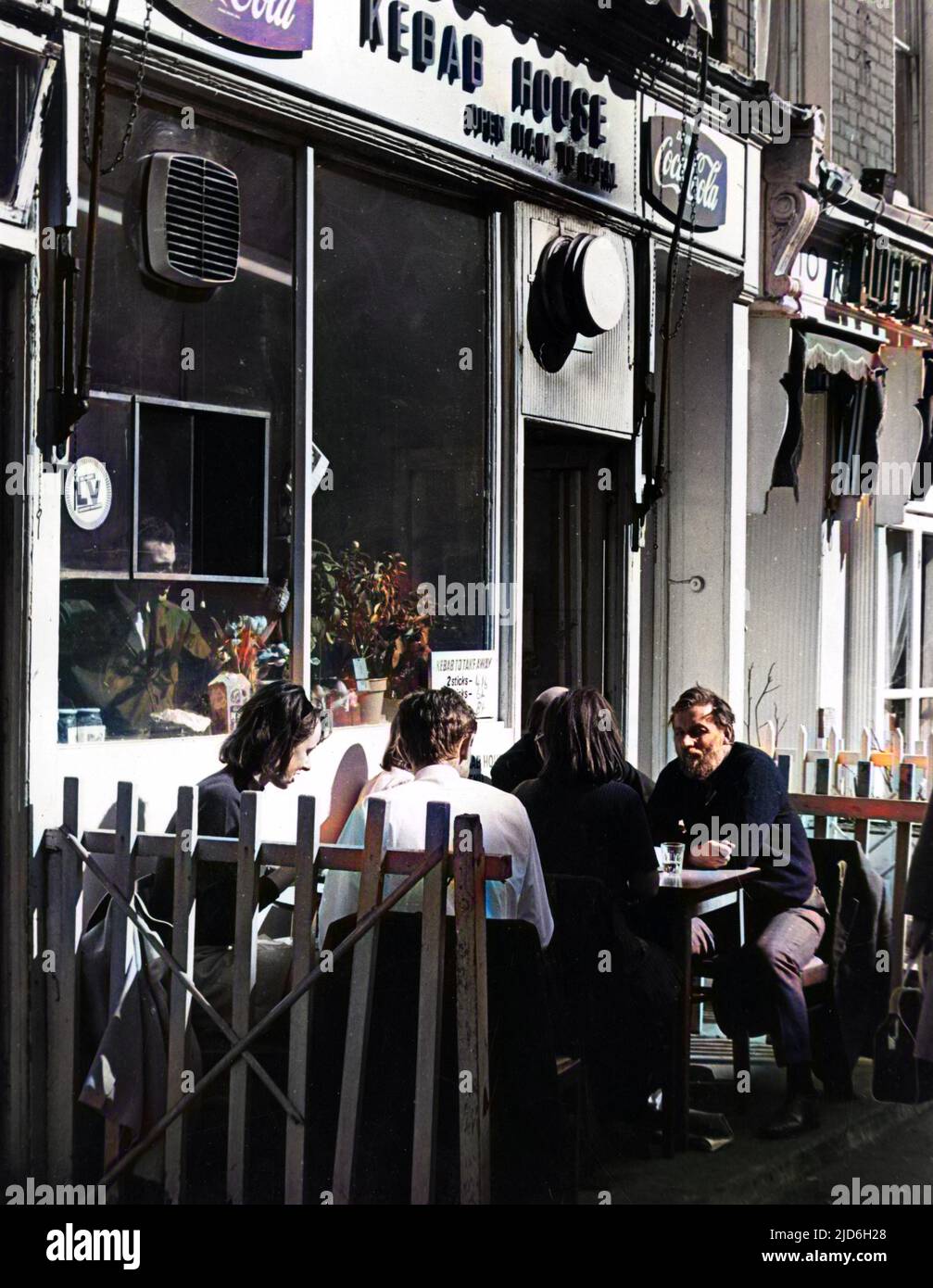 Dining outside a Kebab House on Charlotte Street, central London ...
